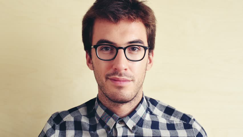 Hipster Man Portrait Looking Stylish As Camera Slowly Tracks Forward ... Hipster Man Portrait Looking Stylish As Camera Slowly Tracks Forward ...
