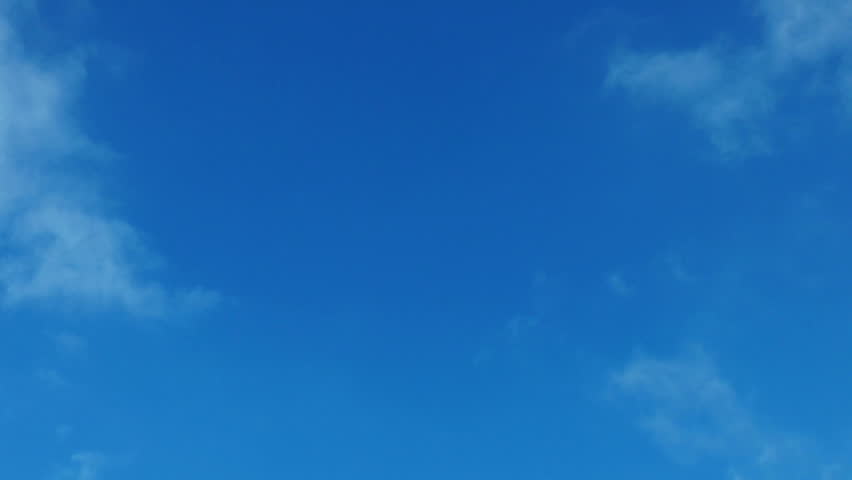 One Minute Long Loop Features White Clouds Floating Through A Deep Blue ...