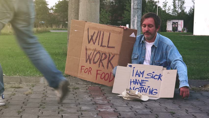 Hobos On The Street With Signs