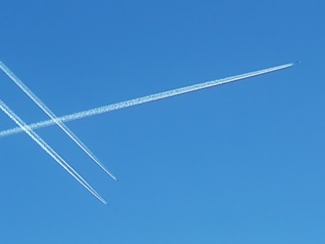 Sky Tracks 02 - White Airplane Tracks On The Blue Sky. Stock Footage ...