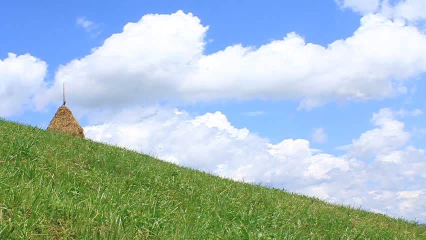 Man Walking Uphill On A Grassy Slope Stock Footage Video 2130584 ...