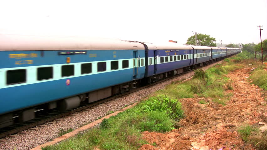 Indian Passenger Train Passes By Suburbs Of Bangalore, Karnataka, India ...