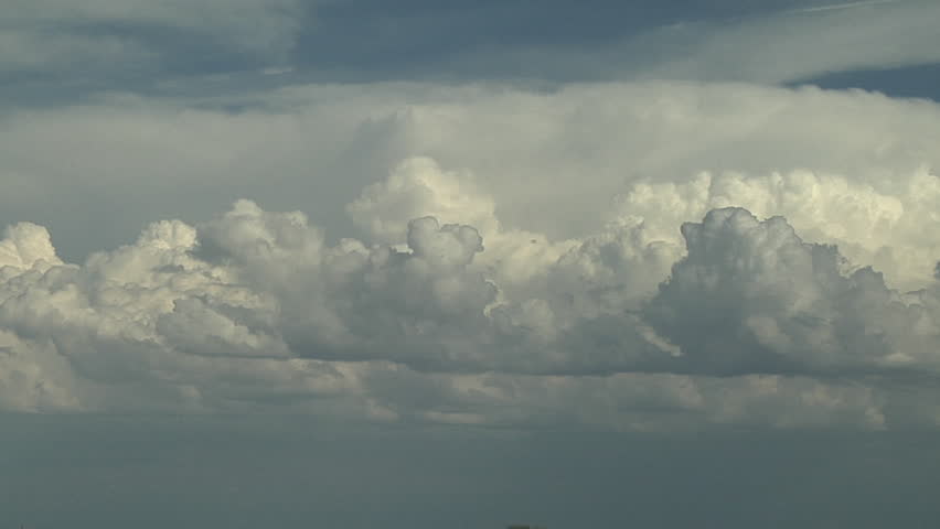 TCU To CB. Towering Cumulus Clouds Rapidly Grow Into Cumulonimbus On A ...