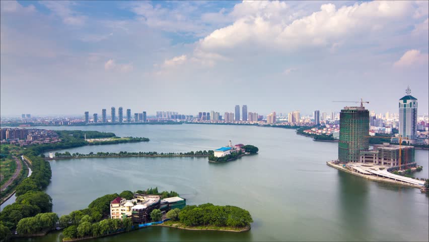 The Chinese City Of Nanchang, Jiangxi Province, The Road And The Lake ...