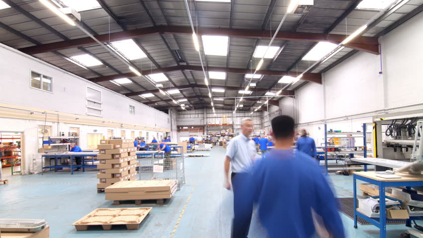 Modern Manufacturing Industrial Workplace. Busy Workers On The Shop ...