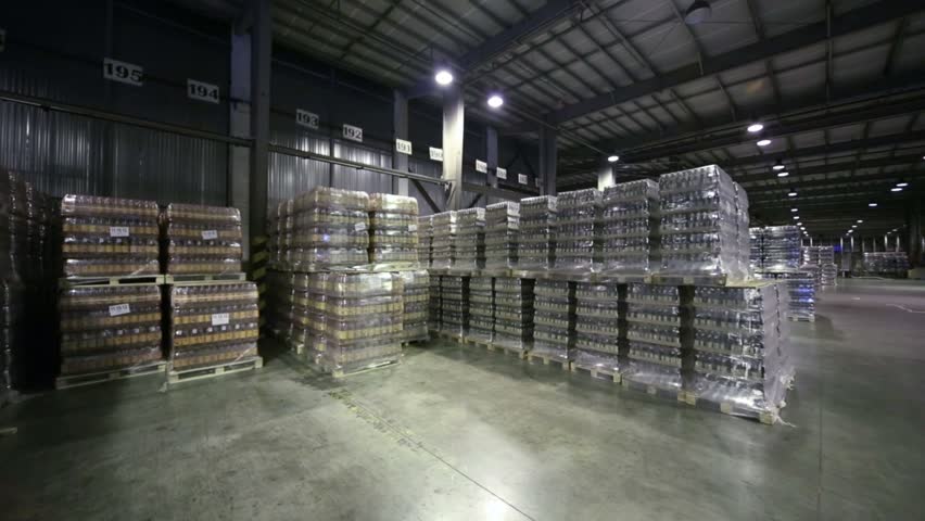 Lot Of Packaged Beer Pallets In Large Brewery Warehouse Stock Footage ...