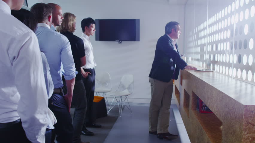 Queue Of People Waiting In Line To Be Served. Could Be A Post Office ...