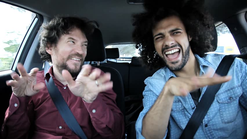 Two Men In Car Having Fun Singing And Dancing Stock Footage Video ...