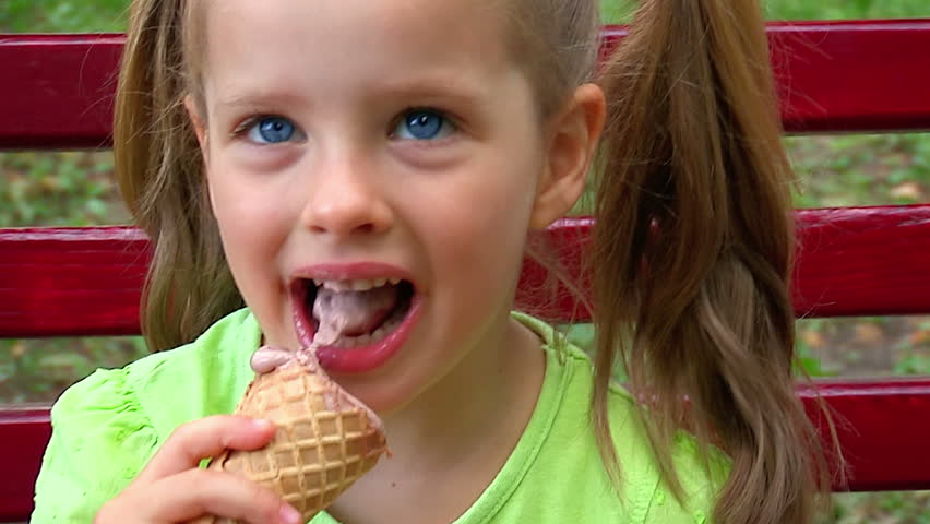 Child Eating Ice-cream At Beack In Park Outdoor. Stock Footage Video ...